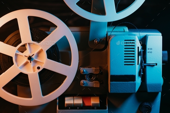 White reels with film rotating. Analog player. Retro old-fashioned 8mm ...