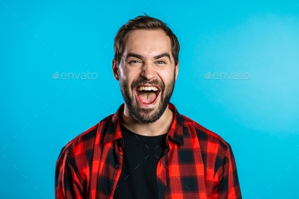 Man in red shirt very glad and happy, he smiling, screaming Stock Photo ...
