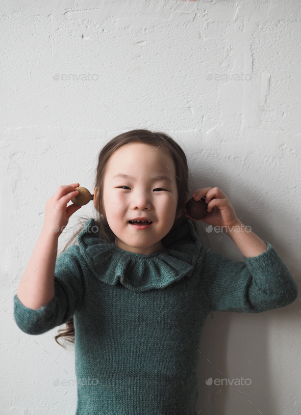 Lovely little asian girl smile at camera on white background, portrait ...