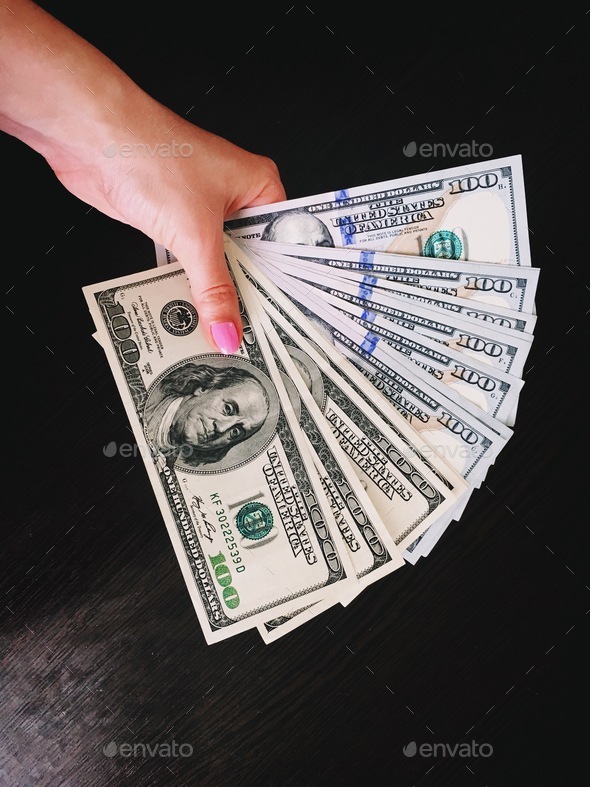 Female hand. Dollars in woman's hand Stock Photo by Kohanova | PhotoDune