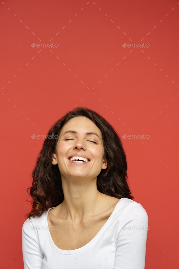 Portrait of carefree female in 30s with closed eyes, perfect skin ...