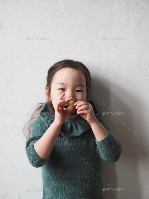 Lovely little asian girl smile at camera on white background, portrait ...
