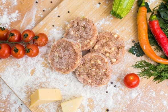 Fresh frozen Meat cutlets with cheese and herbs. Semi-finished products ...