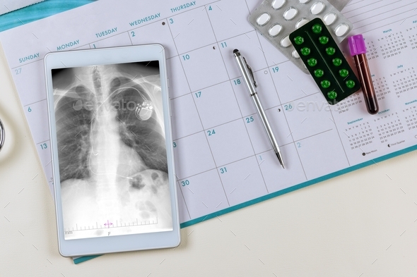 Medical office with doctor checks the correct installation of a ...