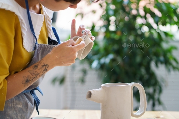 Ceramics hobby and small business: artisan woman model clay cap for ...