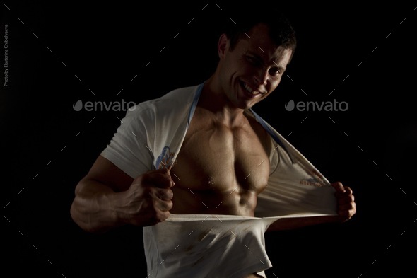 male bodybuilder ripping a t-shirt Stock Photo by Chibelek | PhotoDune