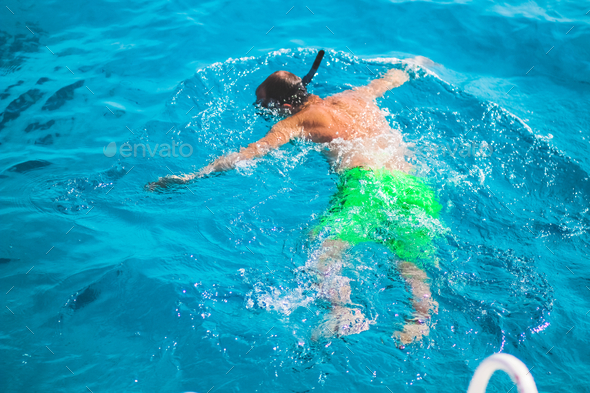 Travel, woman, sea, swimming , Egypt, happy, diving Stock Photo by Chibelek