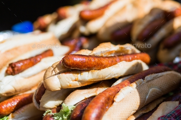 Hot dog, hot dogs are in a bunch, a lot of hot dogs, a showcase with ...