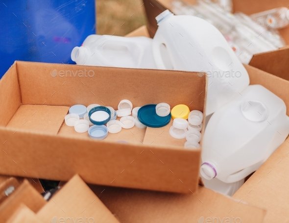 Recycling and environmentally friendly, bottle caps in card board box ...