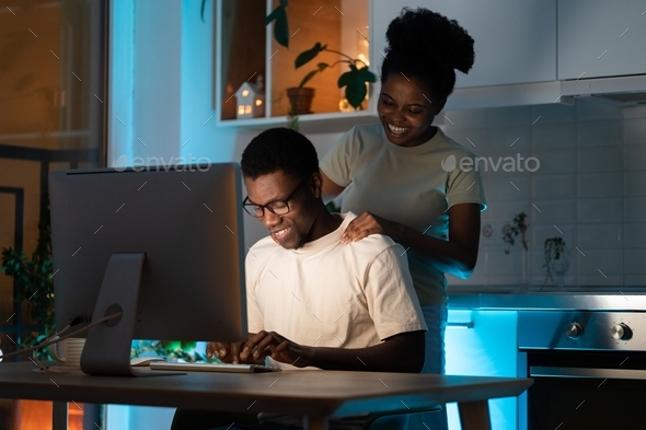 Young web developer working from home, code app or programming with ...