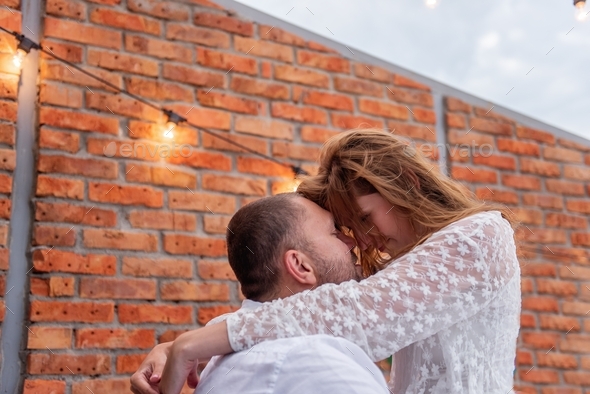 Loving couple millennials hug each other, touch forehead to forehead ...