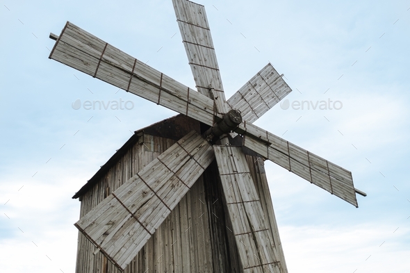 Windmill on sky background. Natural materials concept Stock Photo by ...
