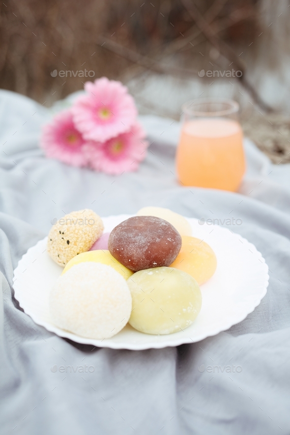 japanese ice cream mochi in rice dough. Stock Photo by perminovakseniia