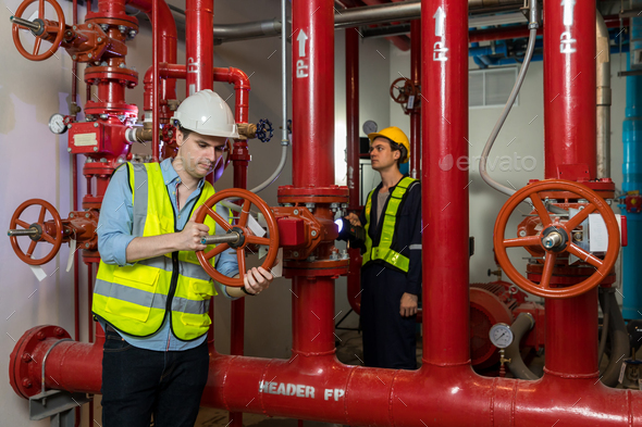 Engineer or technician work checking Fire suppression system and fire ...