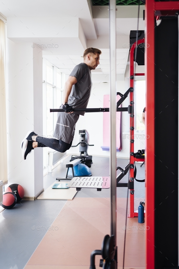 Daily sport routine, healthy lifestyle. Blonde Man practicing sport in ...