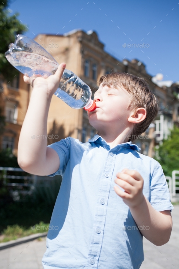 little boy drink water Stock Photo by perminovakseniia | PhotoDune
