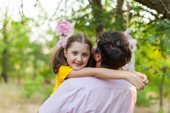 Smiling little girl hugging her father Stock Photo by InnaVlasova ...