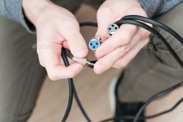 electrical wires in male hands Stock Photo by Tatiana_Mara | PhotoDune