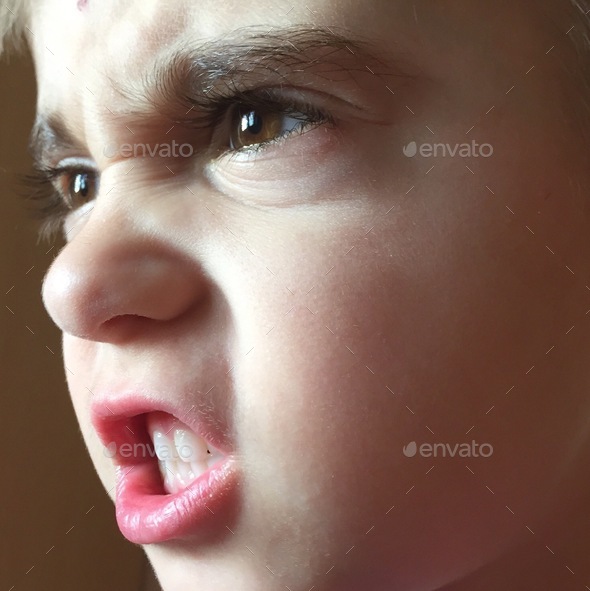 Angry face boy portrait Stock Photo by ametov41 | PhotoDune