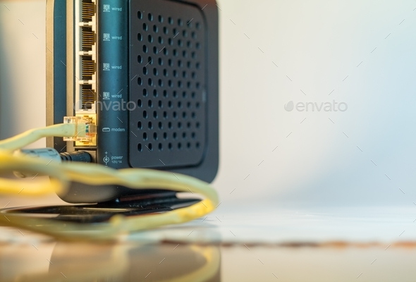 Router, ethernet ports and cable Stock Photo by LittleIvan | PhotoDune