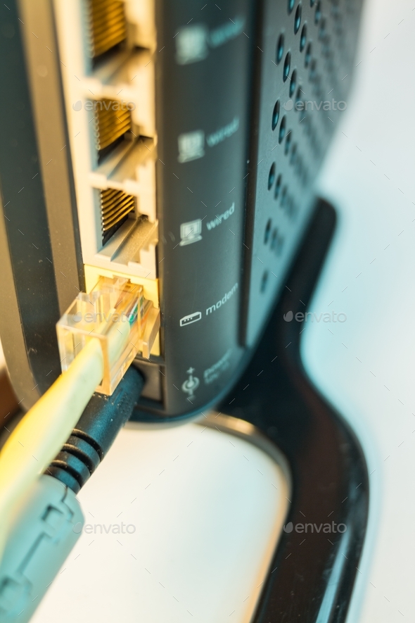 Router, ethernet ports and cable Stock Photo by LittleIvan | PhotoDune