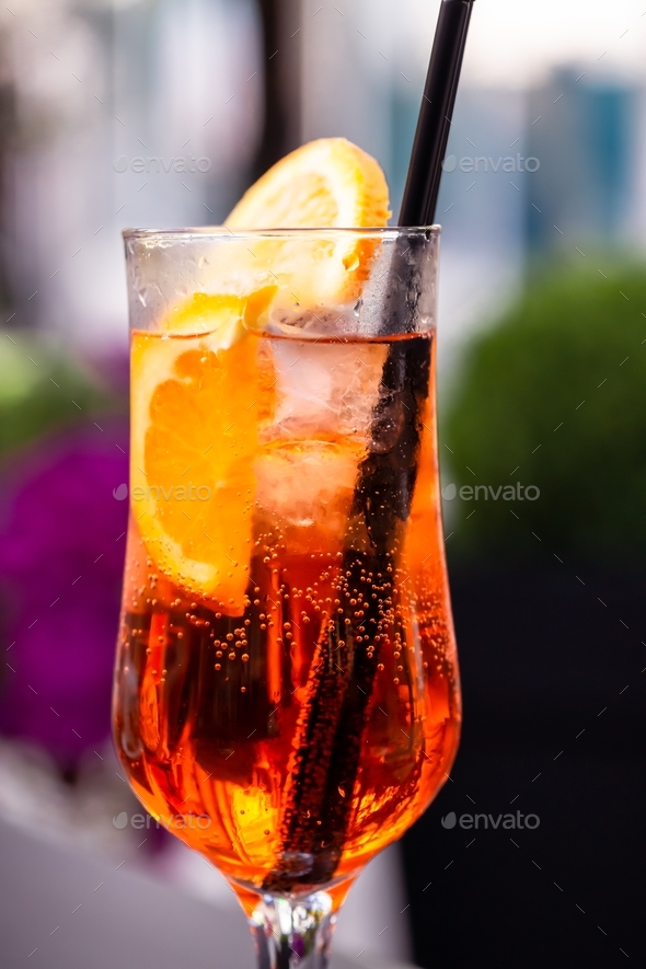 Aperol spritz with orange slice at outside cafe Aperol is an Italian ...