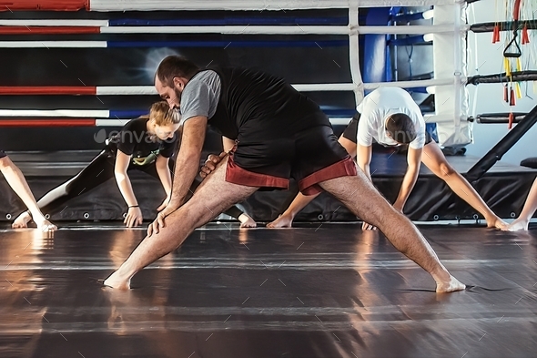 Training boxers in a gym with a trainer Stock Photo by olgar23 | PhotoDune