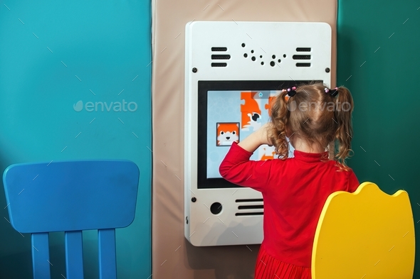 children use modern technology in the form of computer games Stock ...