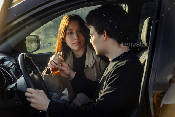 young married couple quarreling in the car over alcohol Stock Photo by ...