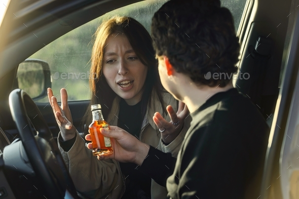 young married couple quarreling in the car over alcohol Stock Photo by ...