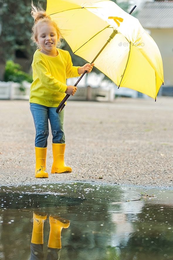 children on an active walk after the rain on a warm day Stock Photo by ...