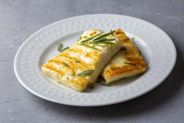 Grilled halloumi cheese. Fried halloumi cheese. Stock Photo by esindeniz