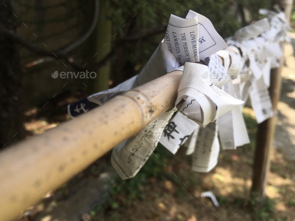 Prayer notes tied on wooden pole Stock Photo by reinasmyth | PhotoDune