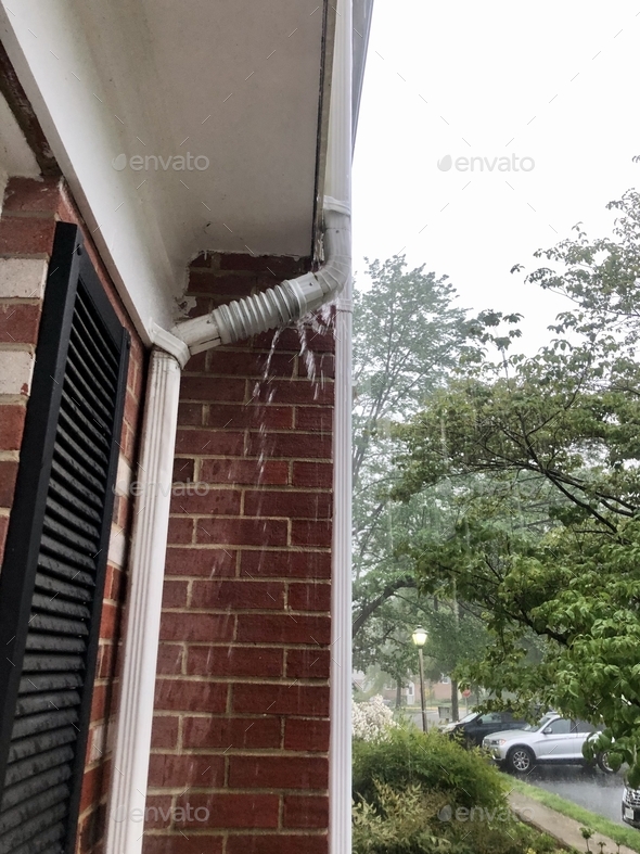 Rain overflowing gutters and downspout Stock Photo by reinasmyth ...