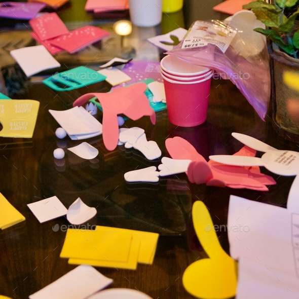 Messy table of colorful pastel colors easter crafts Stock Photo by ...
