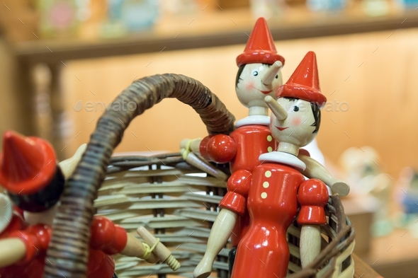 wooden boy Pinocchio from Carlo Collodi's fairy tale in the window in ...