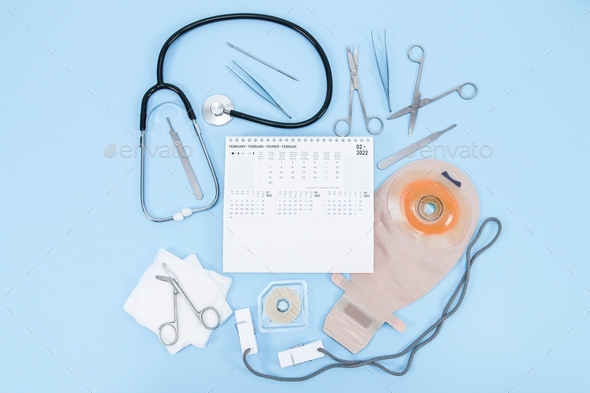 Surgeon's set: from a colostomy bag, surgical instruments, a ...