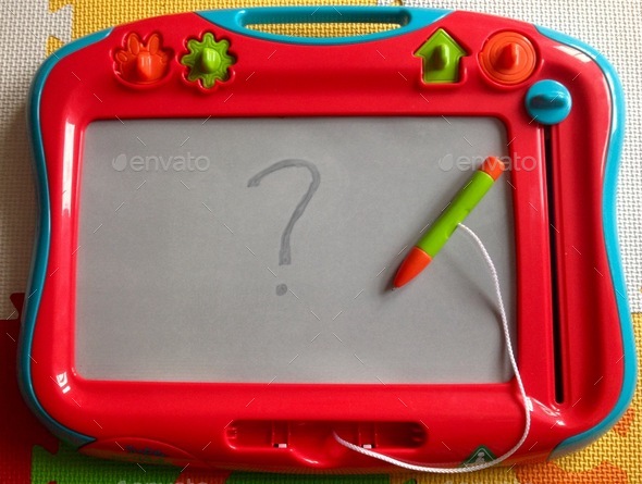 Question mark on child’s drawing toy Stock Photo by reinasmyth | PhotoDune