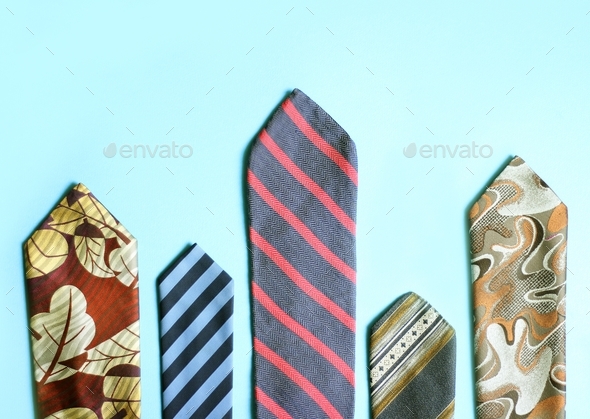 Neckties on a blue background Stock Photo by mirarahneva | PhotoDune