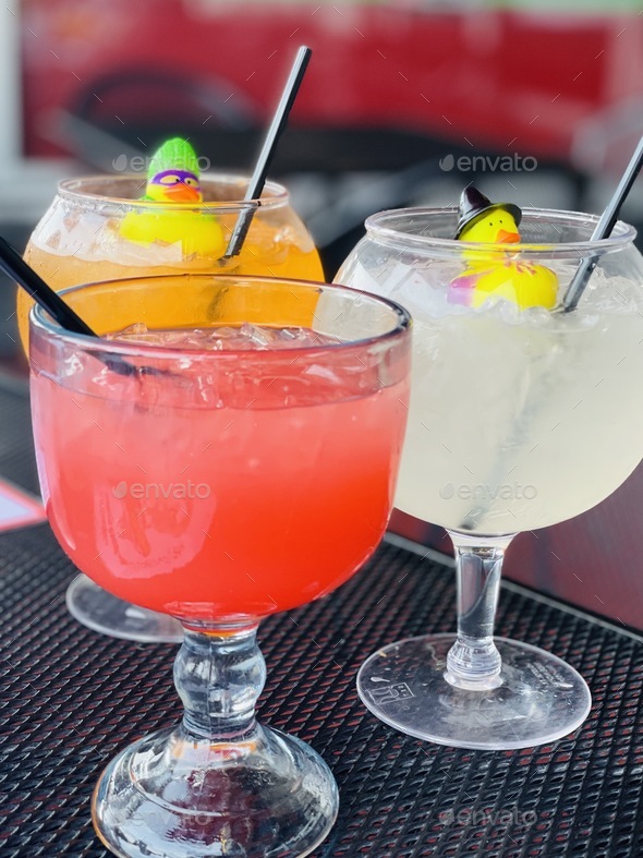 Rubber ducks floating in colorful specialty alcoholic “Death Star ...