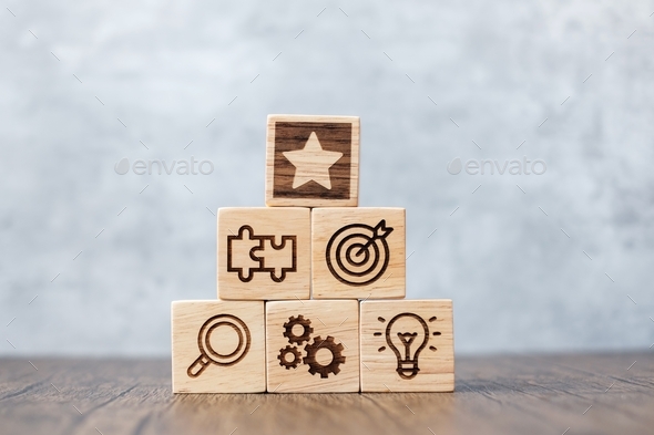wood block with business success, goal, strategy, target, mission ...