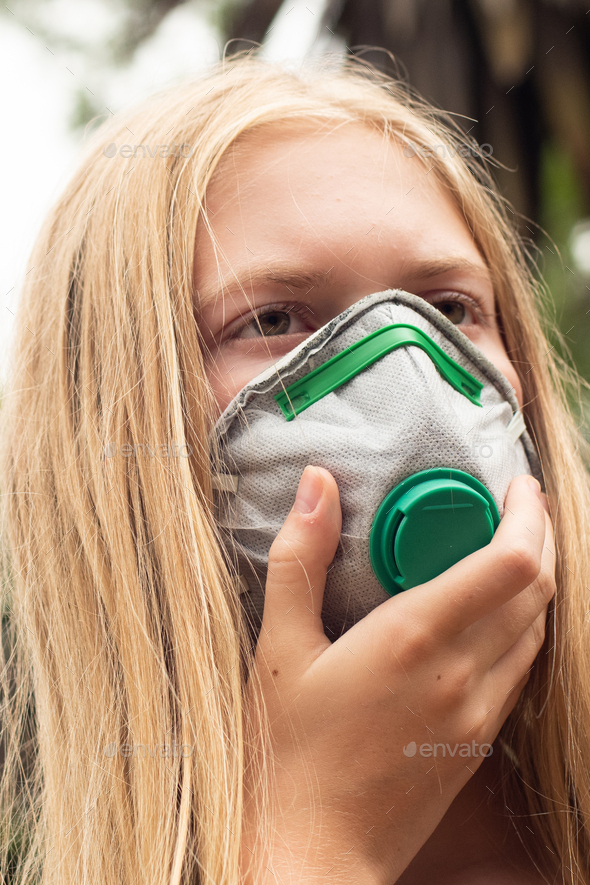 Bond girl wearing face mask to reduce amount of breathing bushfire ...