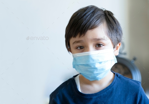 kid face wearing medical face mask, yong boy wearing medical mask Stock ...