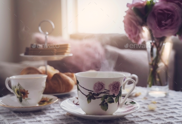 English tea time, Afternoon tea ceremony with cuppa tea, croissants ...