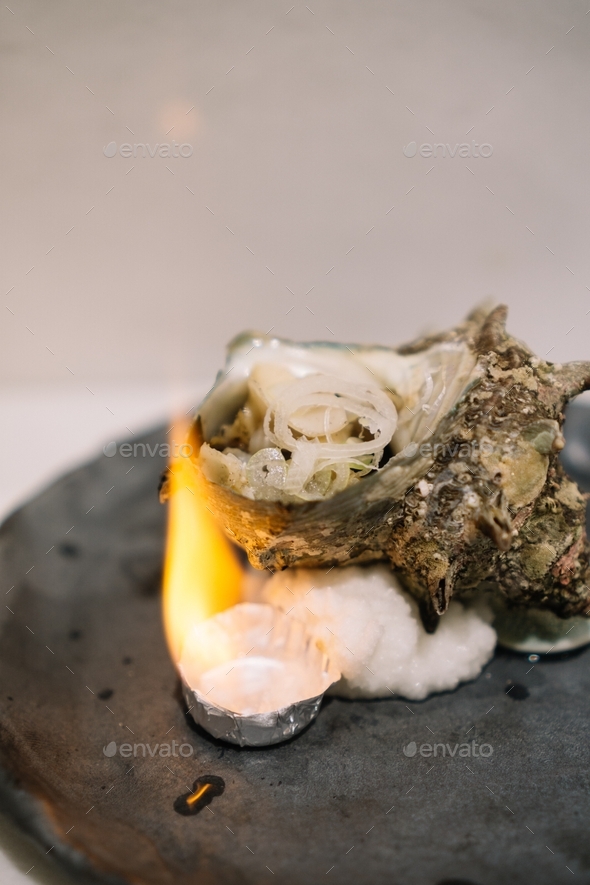 Conch on fire sashimi, Japanese food Stock Photo by wikornr | PhotoDune