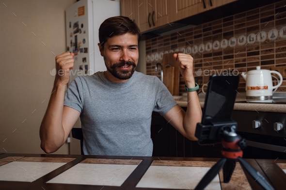 confident young guy vlogger influencer shooting social media video blog ...