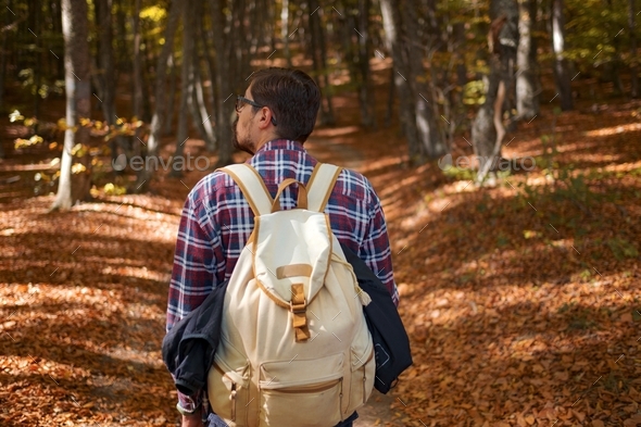 Caucasian male model outdoors in nature. Stock Photo by seleznev_photos