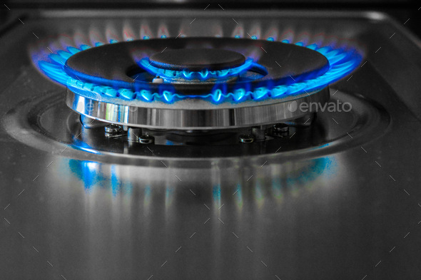 Blue flame on a gas ring of a stove. Pop color. Stock Photo by JosieElias