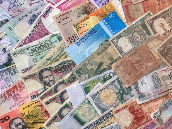 Banknotes of various currencies from different countries of the world ...
