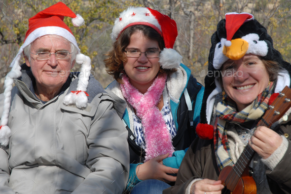 Family group portrait wearing Santa hats at Christmas Stock Photo by ...